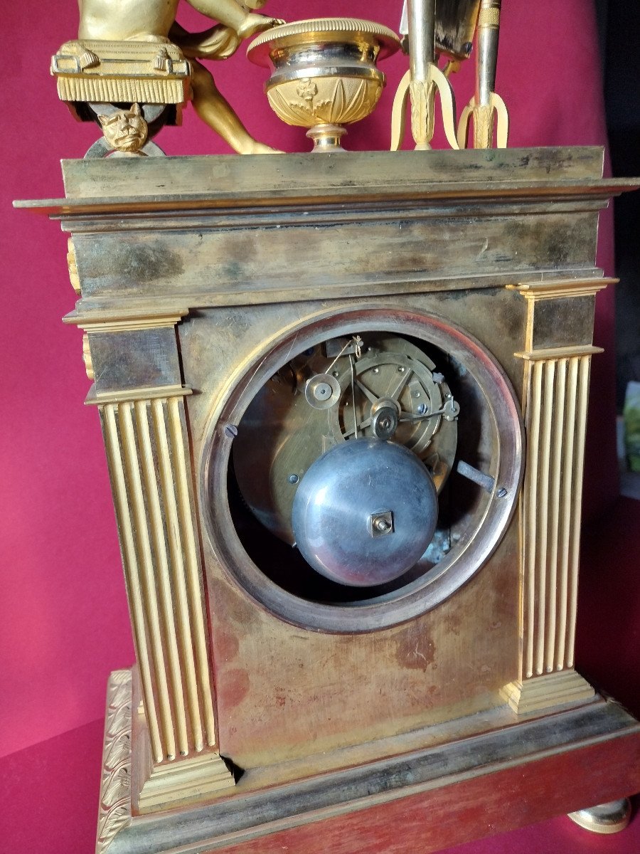 Rare Pendulum In Gilt Bronze And Chiselled, Representing Love At His T