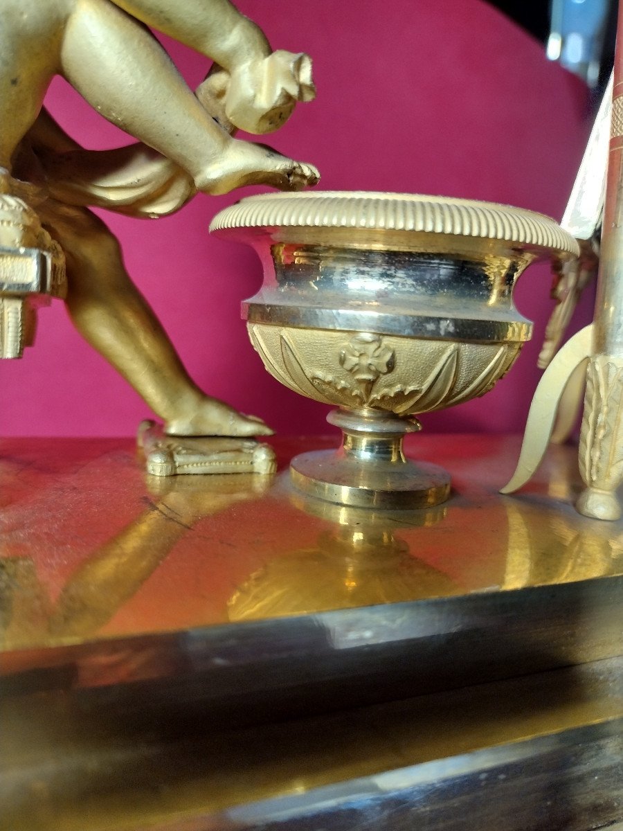 Rare Pendulum In Gilt Bronze And Chiselled, Representing Love At His T