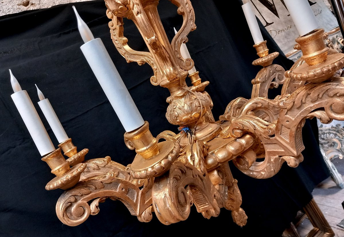 Proantic: grand lustre en bois sculpté doré à la feuille