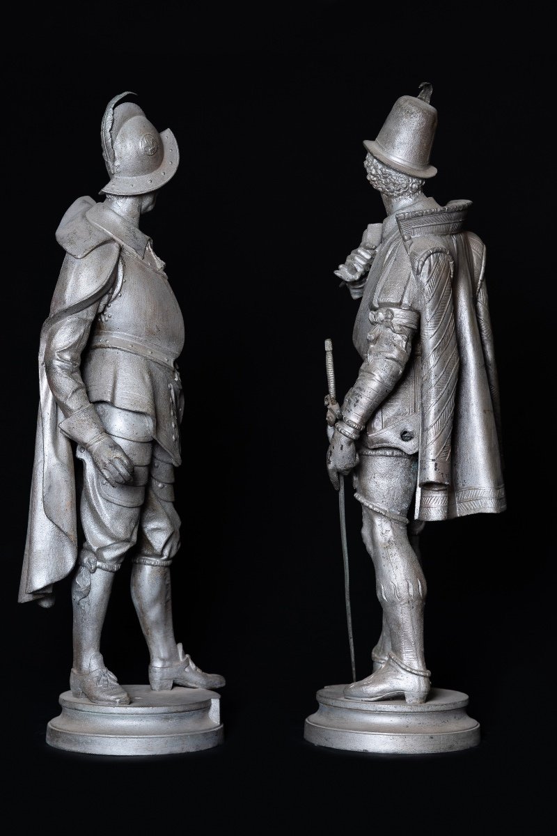 Pair Of Metal Statues